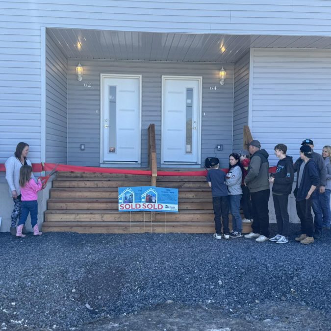 Families moving into new Habitat for Humanity homes in Maxville